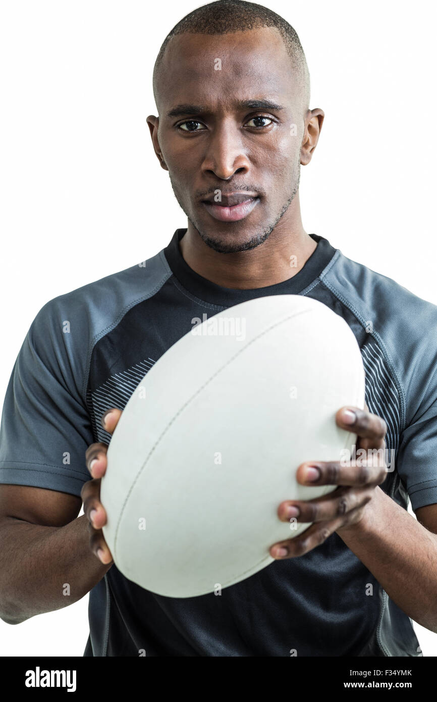 Portrait of sportsman holding rugby Stock Photo - Alamy