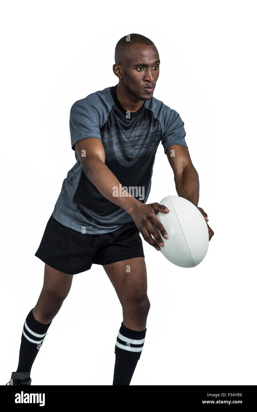 Rugby player in position of throwing ball Stock Photo - Alamy