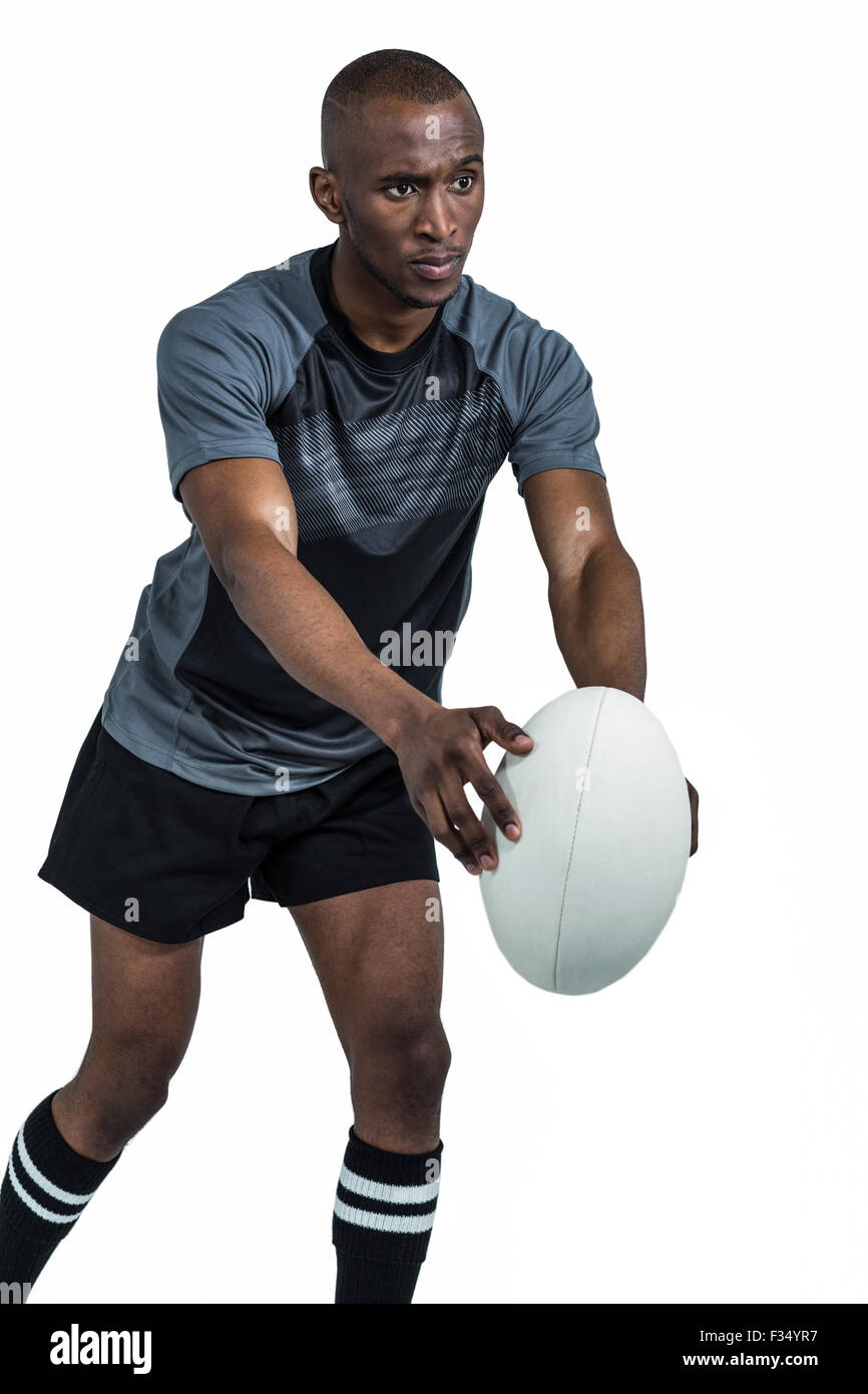 Confident rugby player in position of throwing ball Stock Photo - Alamy
