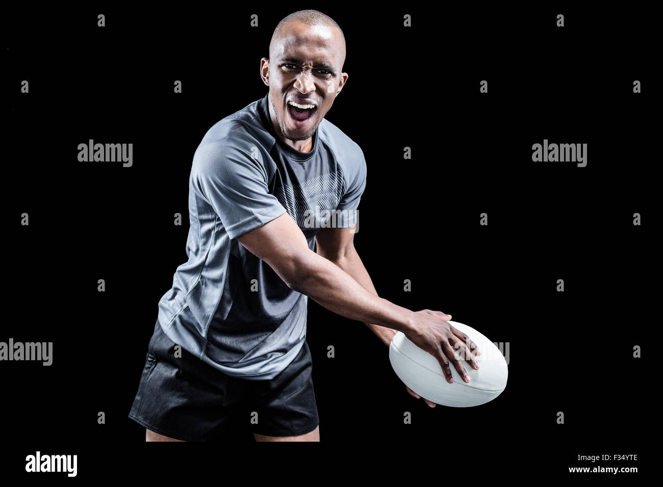 Portrait of aggressive sportsman playing rugby Stock Photo - Alamy