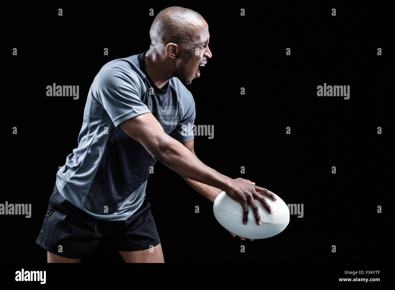 Sportsman playing rugby Stock Photo - Alamy