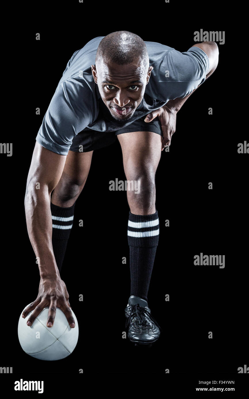 Portrait of rugby player smiling Stock Photo - Alamy