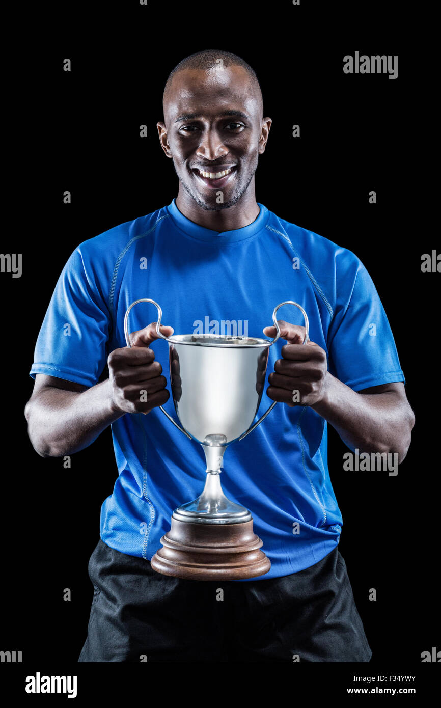 White Runner Holding Trophy