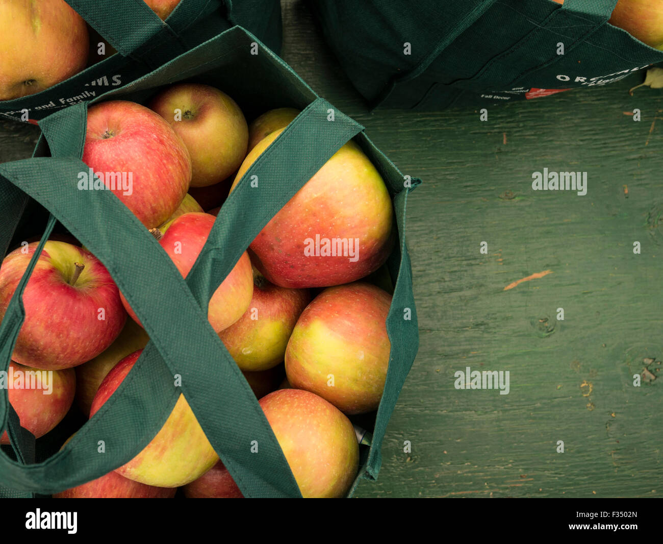 Bag of apples on display in farmers market Stock Photo - Alamy