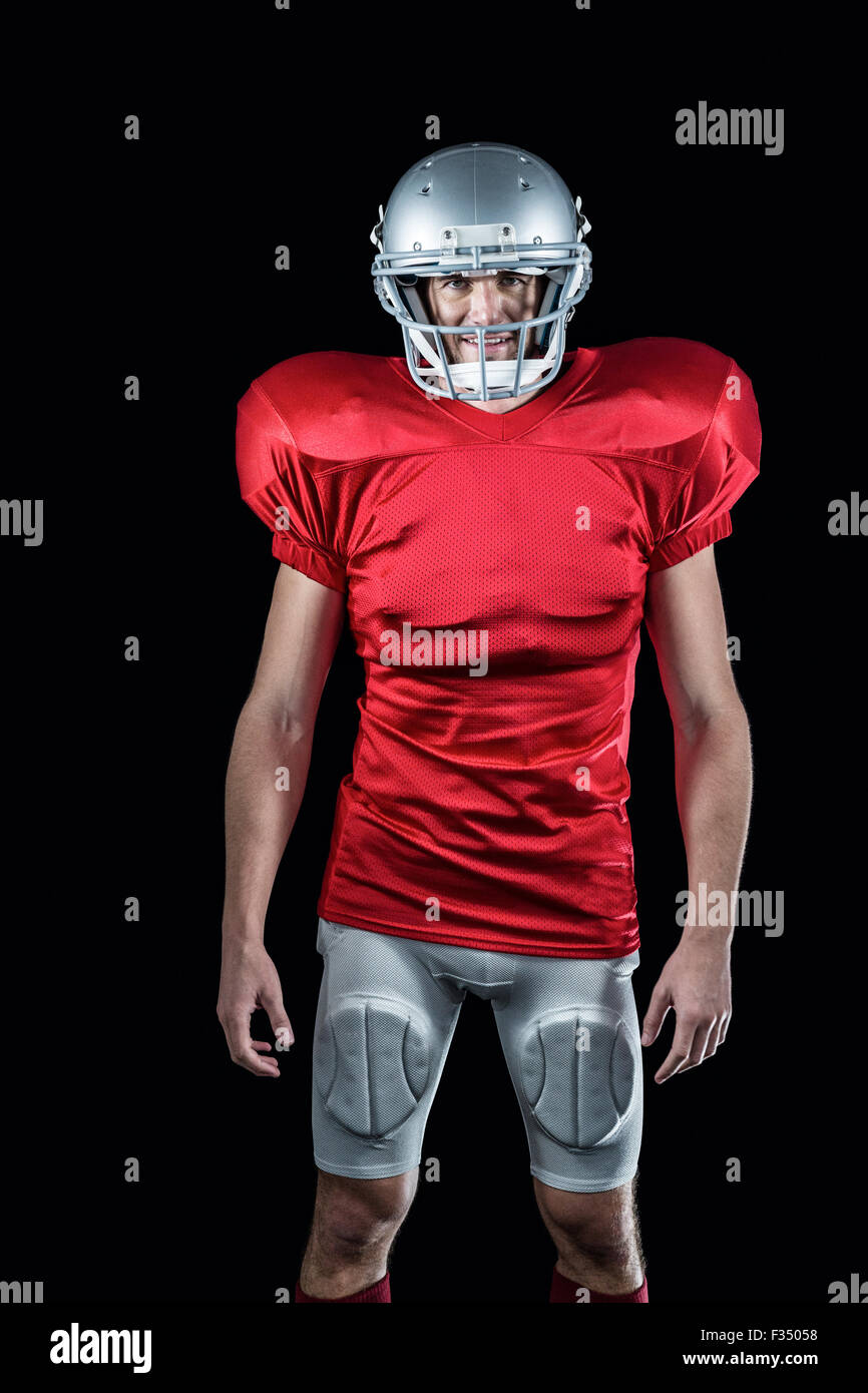 Portrait of confident American football player Stock Photo - Alamy