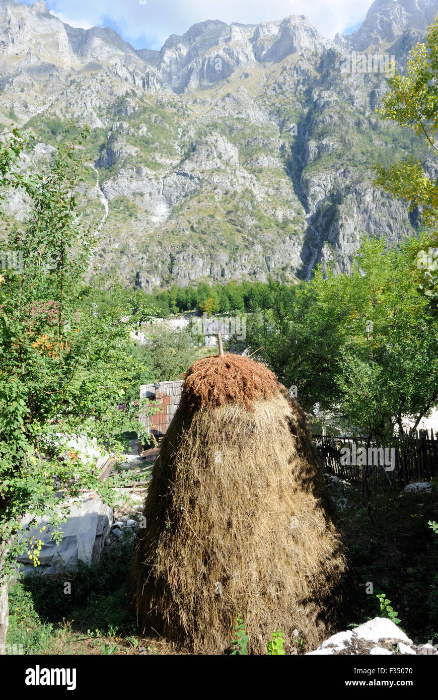 A hay stack in a tiny field among the rocks and woods above Valbone ...