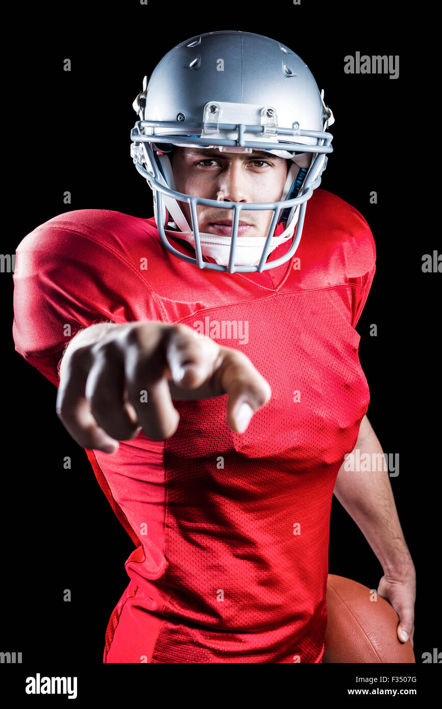 Portrait of American football player pointing Stock Photo - Alamy