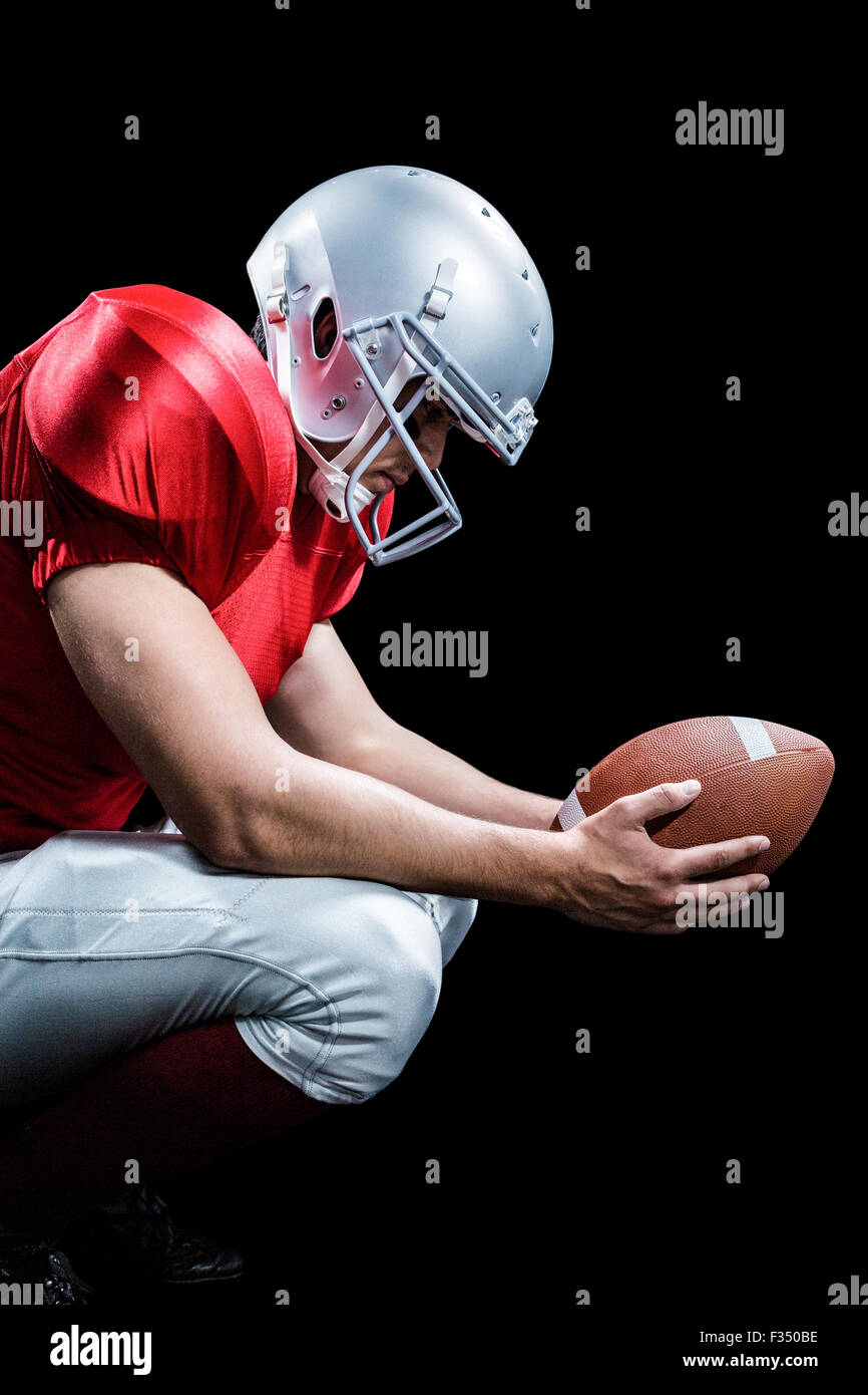 Crouching Football Player Standing