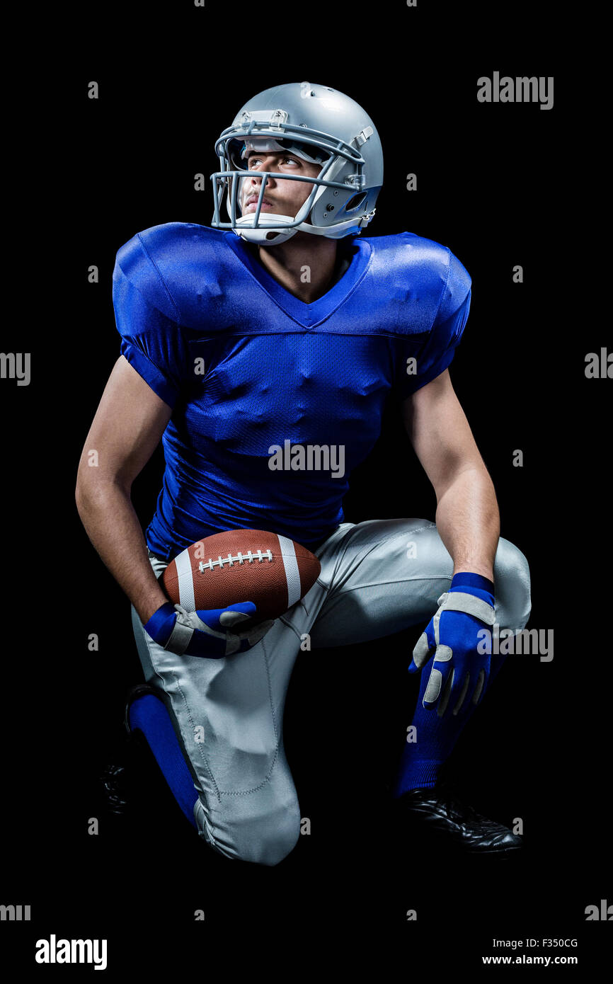 Football kneeling hi-res stock photography and images - Alamy