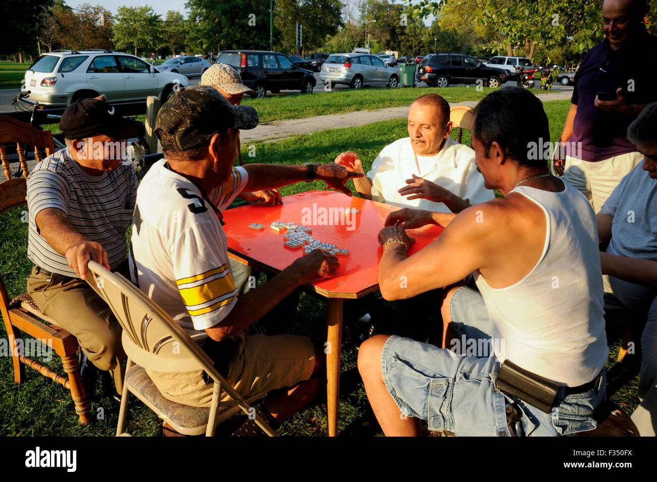 Puerto Rican men playing dominoes in Humboldt Park, Chicago, Illinois ...