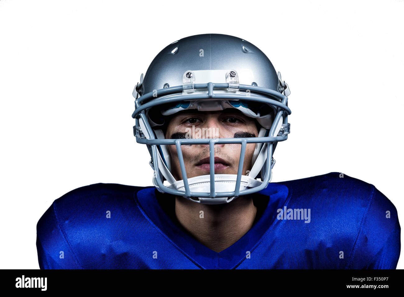 Portrait of determined American football player in uniform Stock Photo ...