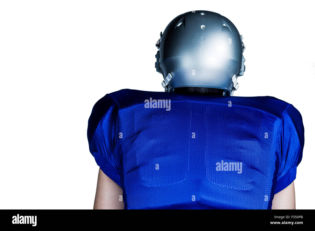 Rear view of American football player Stock Photo - Alamy