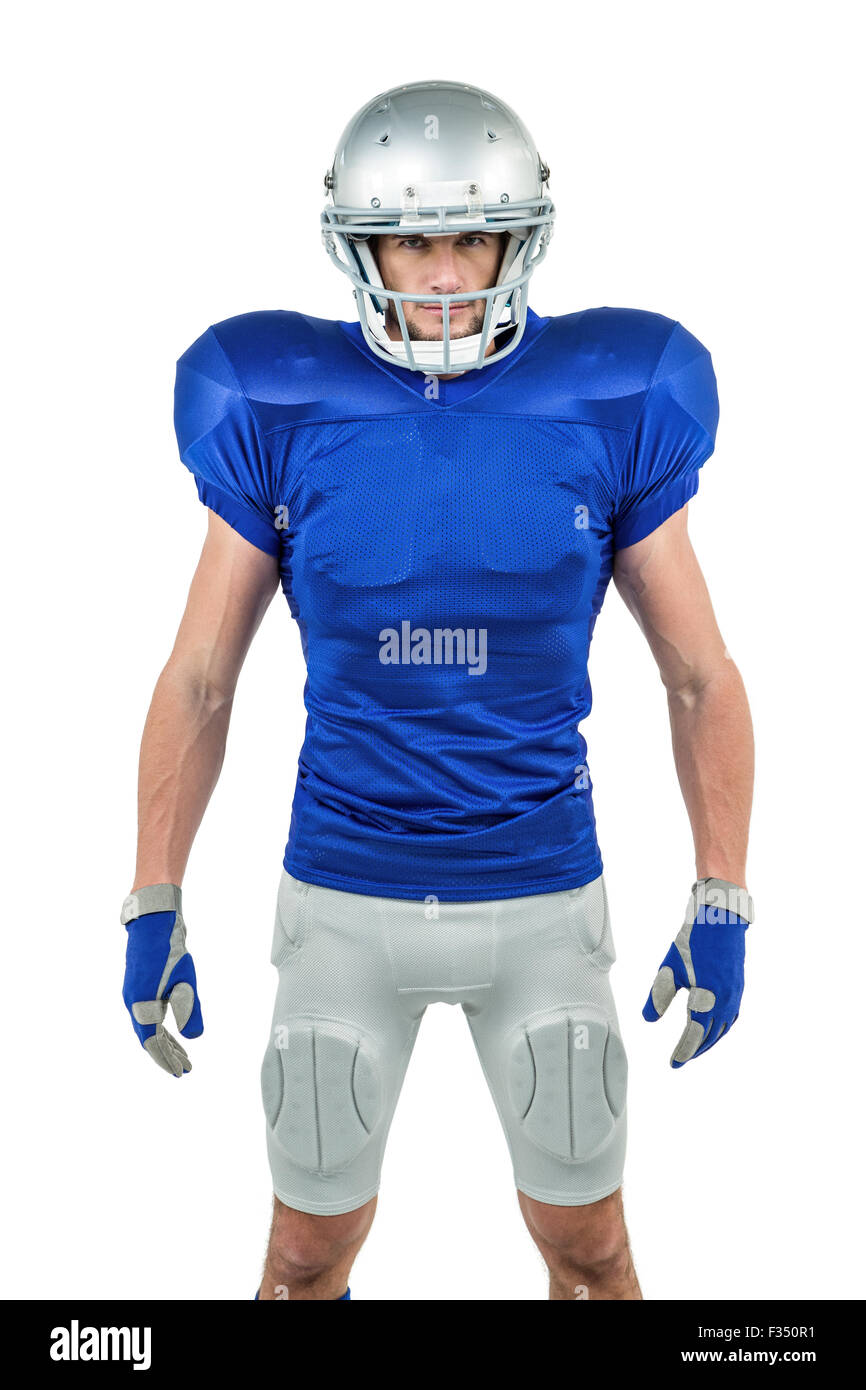 Serious American football player standing Stock Photo - Alamy