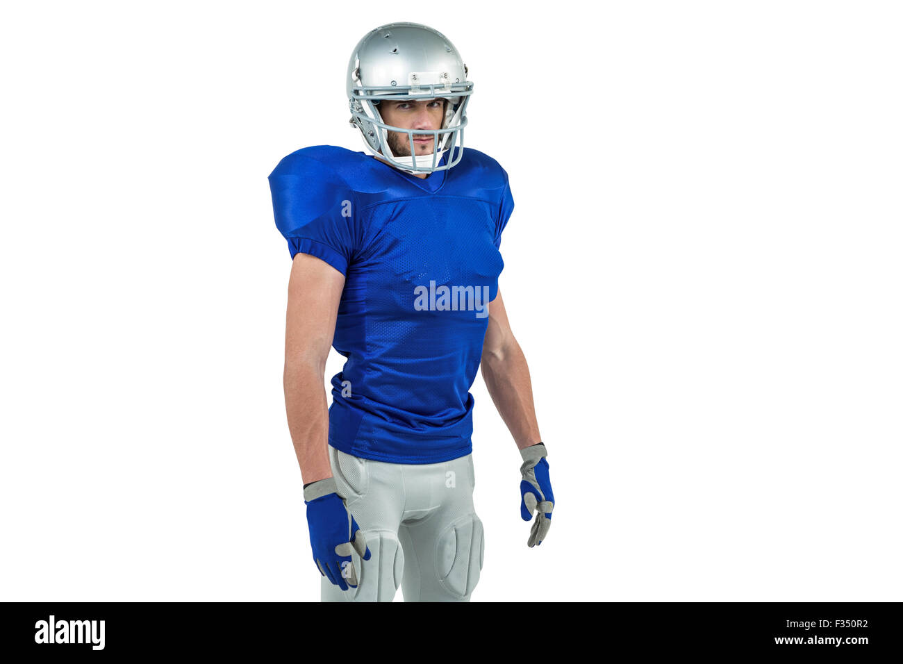 Confident American football player standing Stock Photo - Alamy
