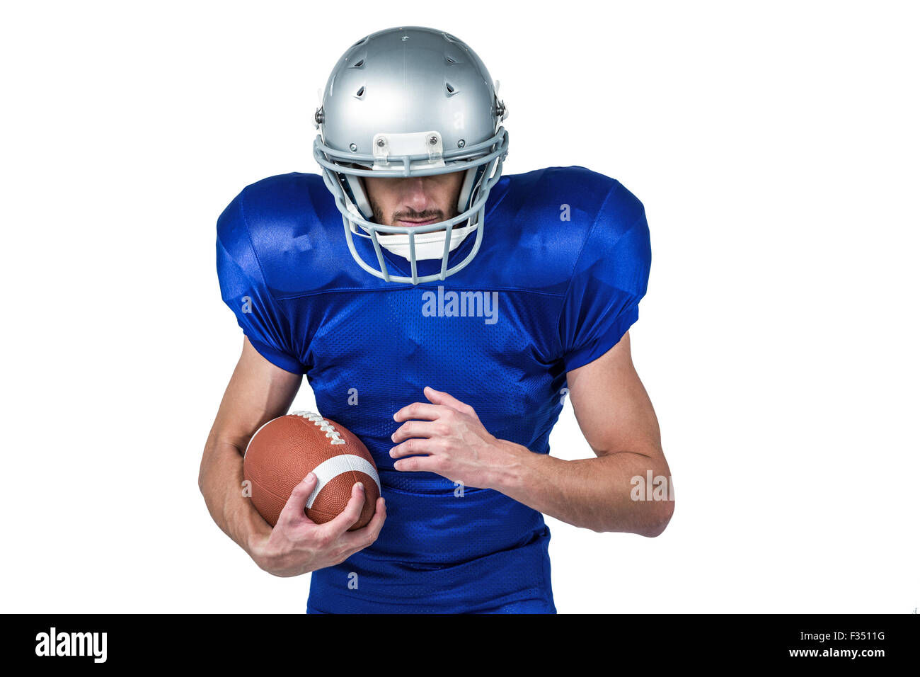 Sports player wearing helmet while holding ball Stock Photo - Alamy