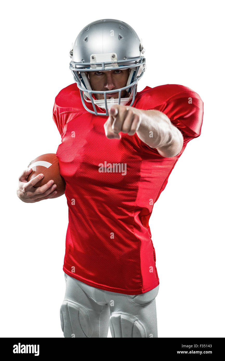 Portrait American football player in red jersey pointing Stock Photo ...
