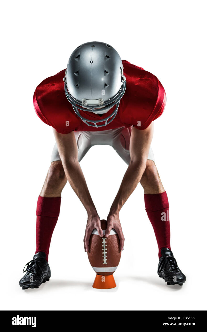 Full length of sports player placing the ball between his legs Stock ...