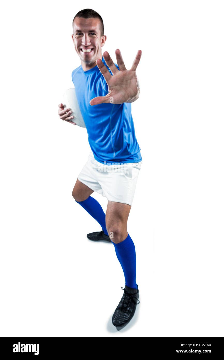 Full length portrait of happy rugby player defending Stock Photo - Alamy