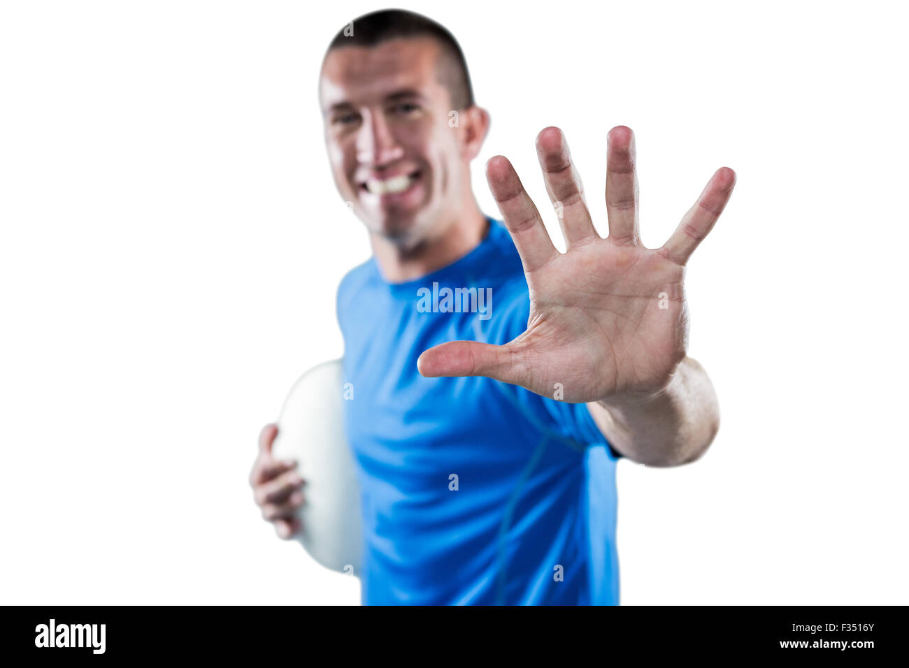 Portrait of happy rugby player defending Stock Photo - Alamy