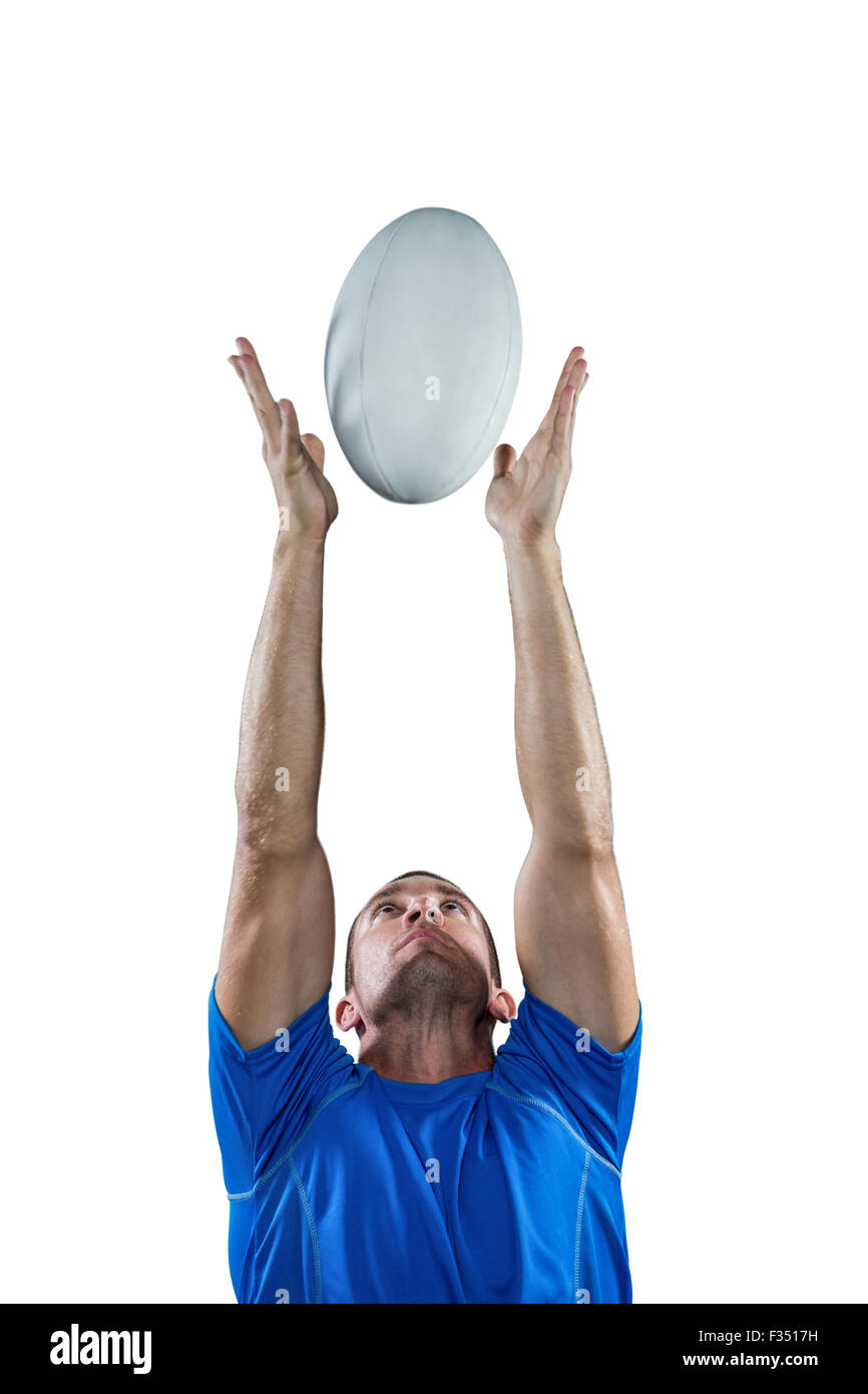 Rugby player catching ball Stock Photo - Alamy