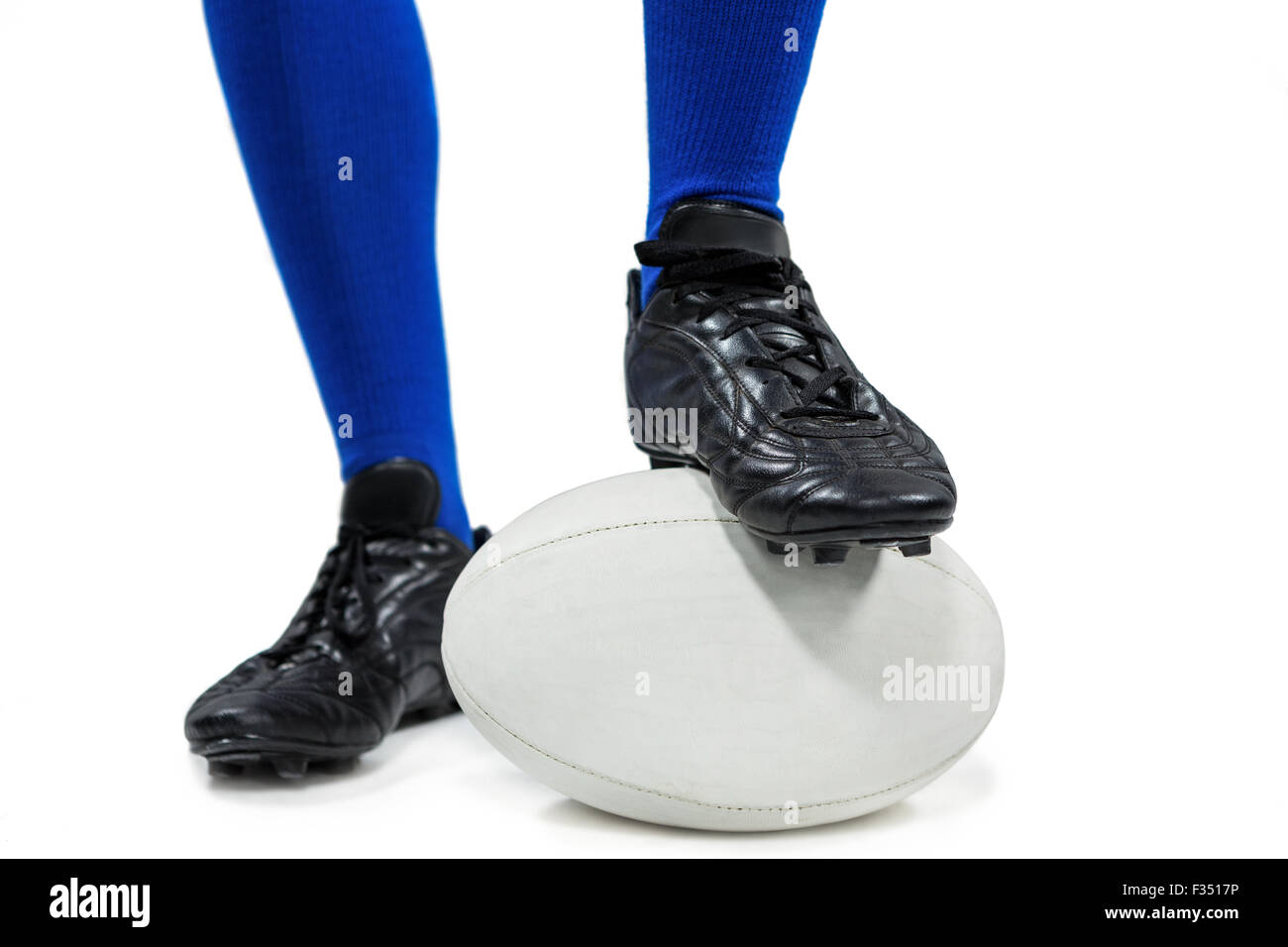 Low section of of rugby player on ball Stock Photo - Alamy