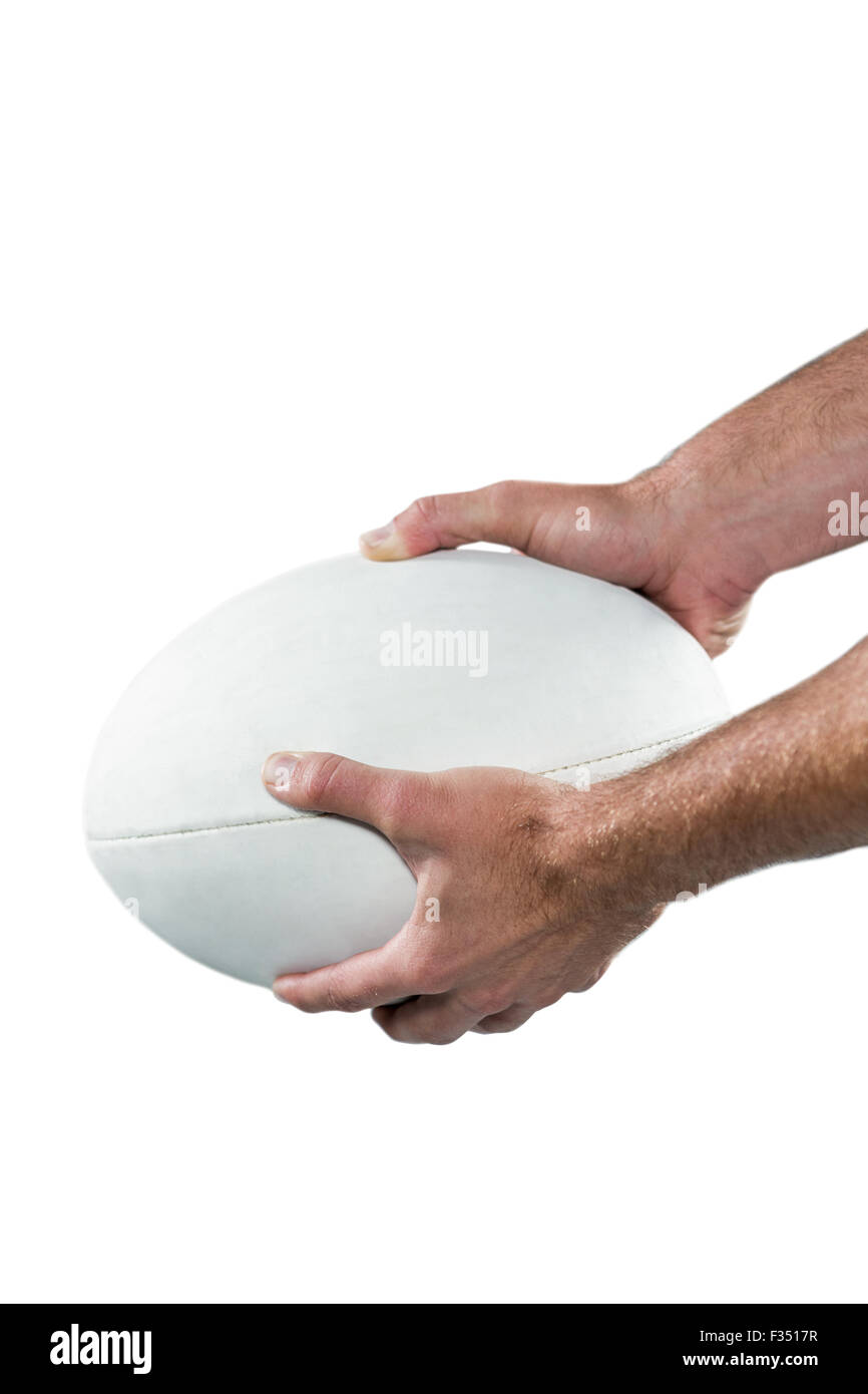 Sports player holding ball Stock Photo - Alamy