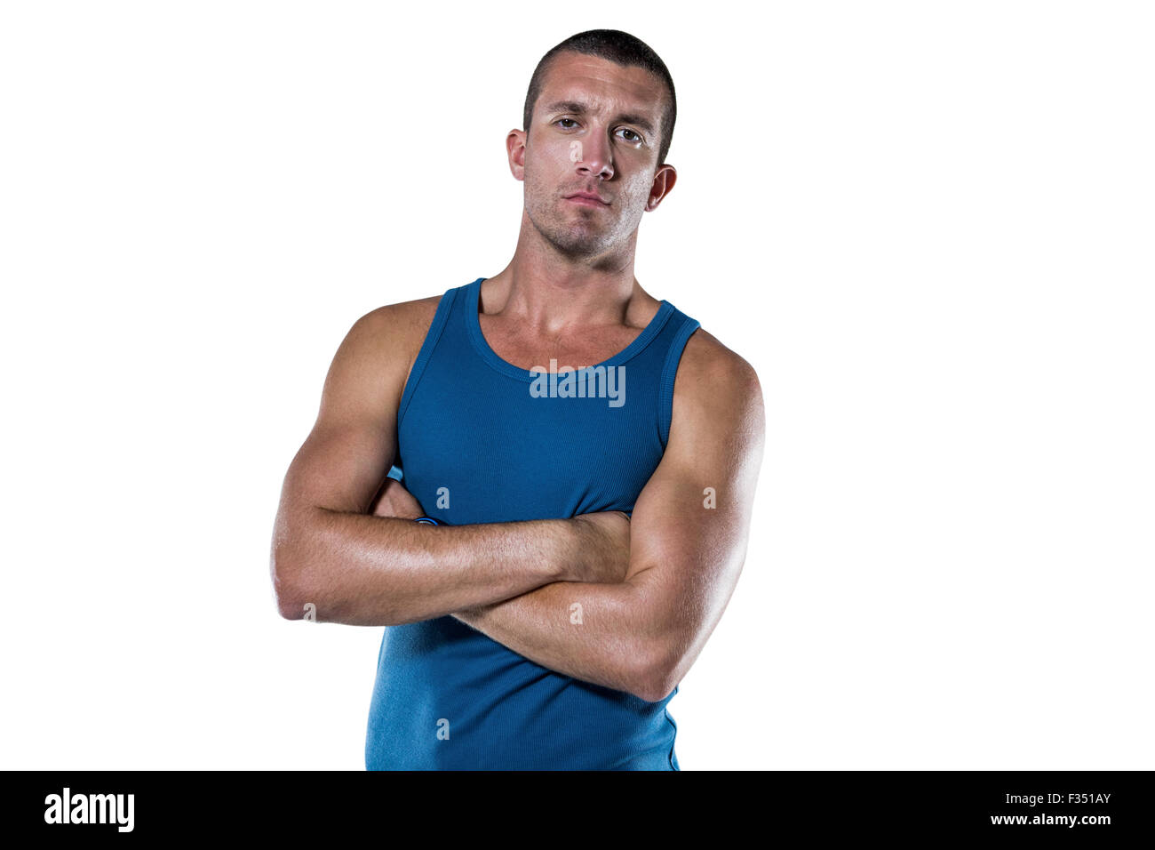 Serious athlete with arms crossed Stock Photo - Alamy