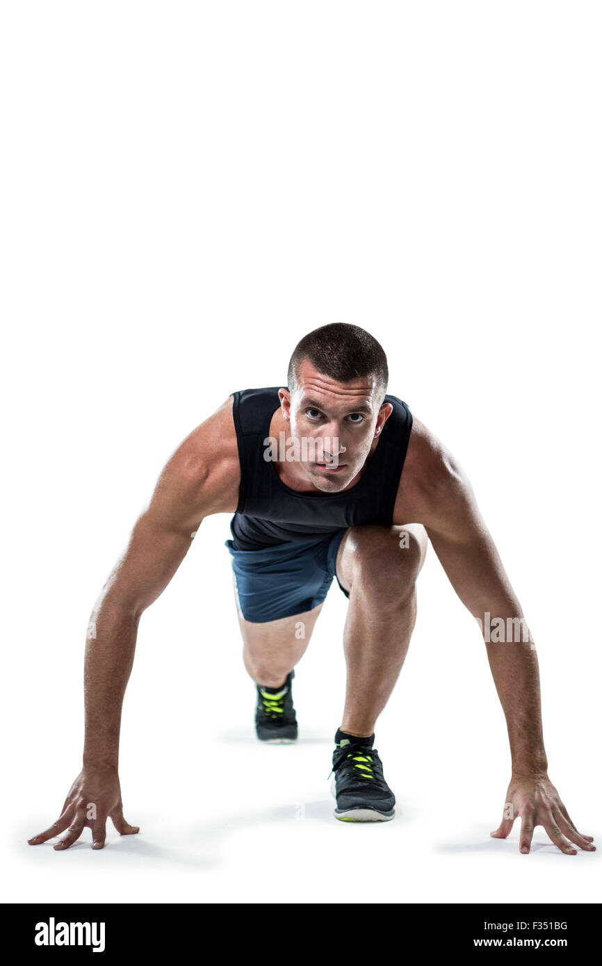 Full length portrait of runner ready to race Stock Photo - Alamy