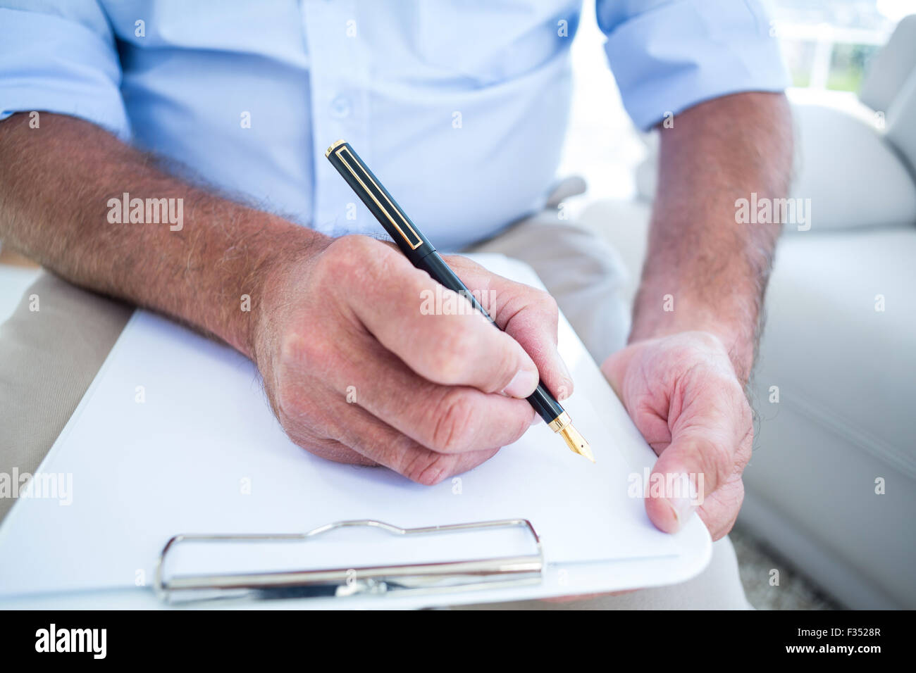 Businessman pen notepad hi-res stock photography and images - Alamy