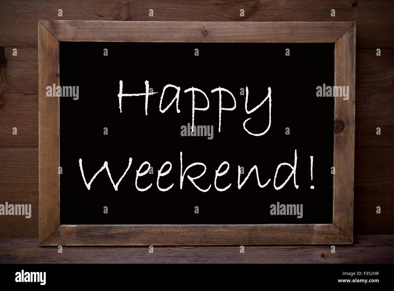 Chalkboard With Happy Weekend Stock Photo - Alamy