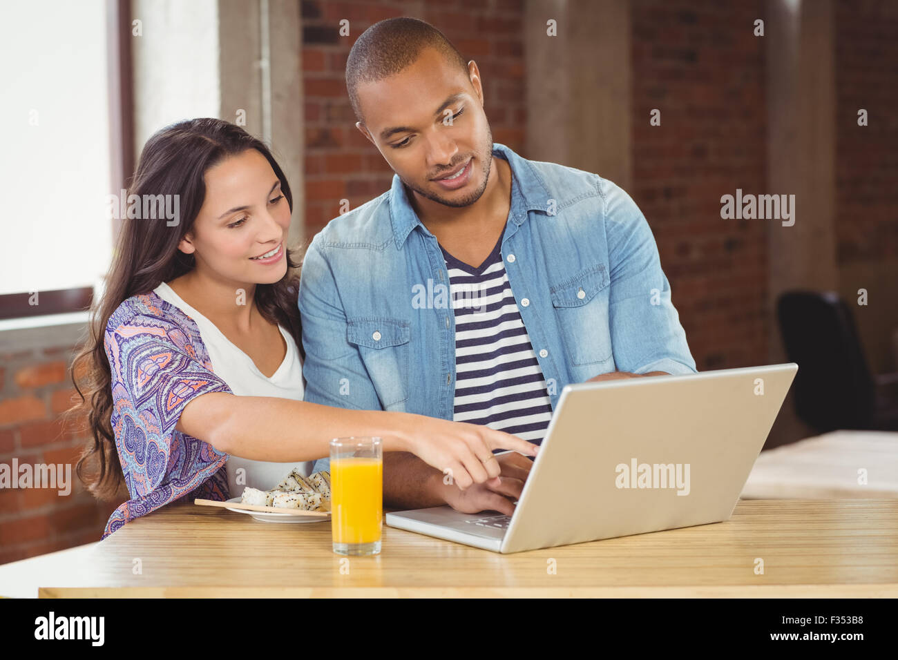 Pointing to laptop hi-res stock photography and images - Alamy