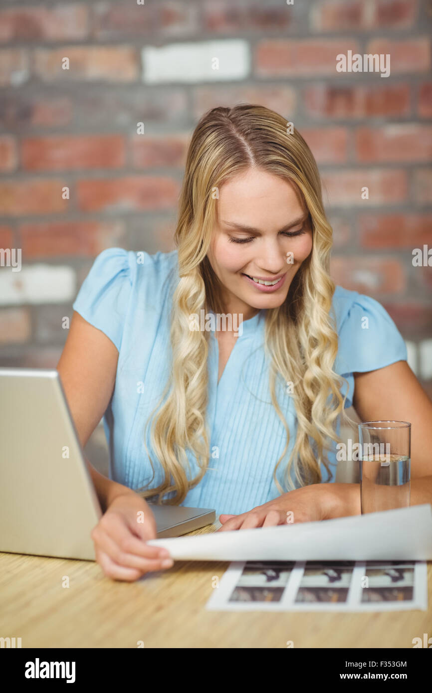 Woman looking at photos hi-res stock photography and images - Alamy