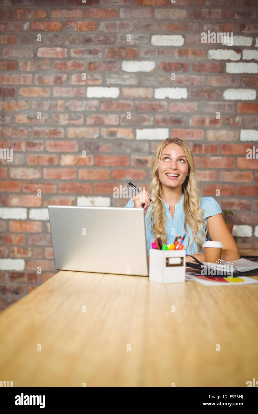 Smiling woman working Stock Photo - Alamy