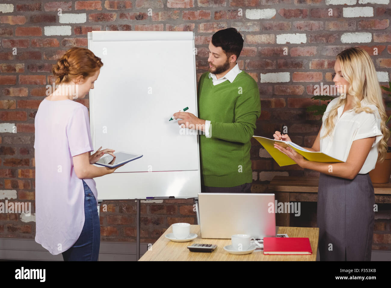 During creative presentation team hi-res stock photography and images ...