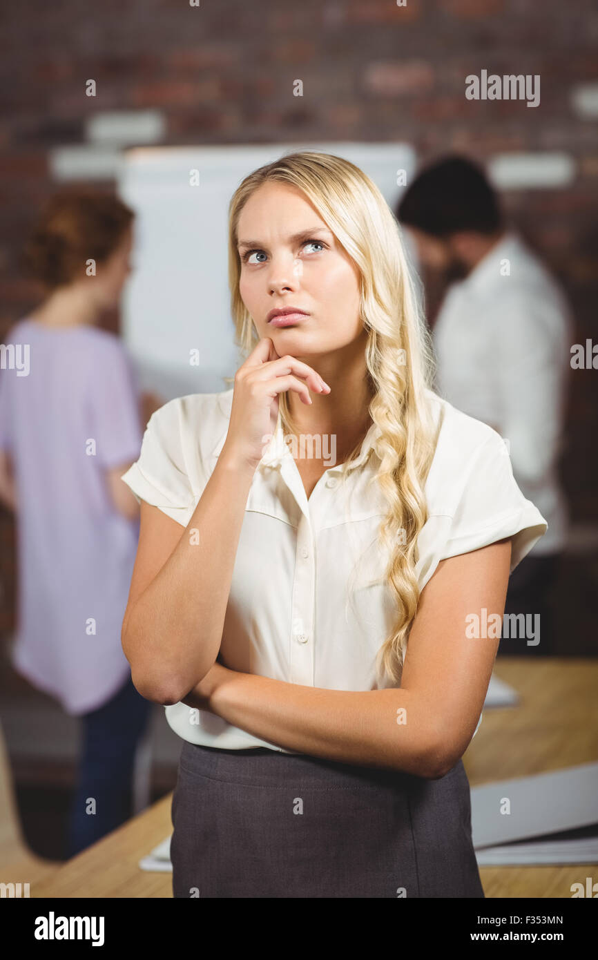 Woman standing in office hi-res stock photography and images - Alamy