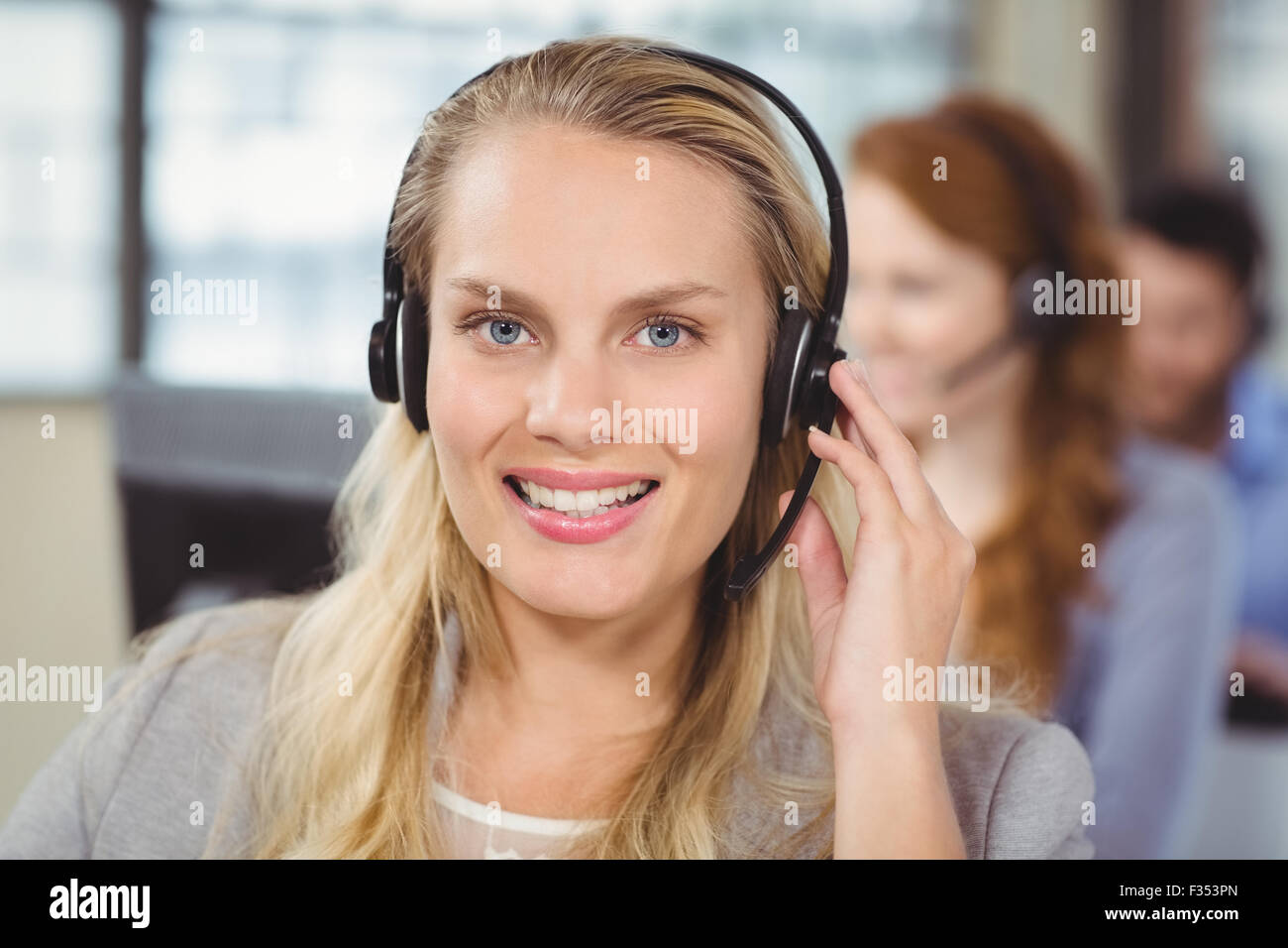 Portrait of cheerful operator Stock Photo - Alamy Portrait of cheerful operator Stock Photo - Alamy