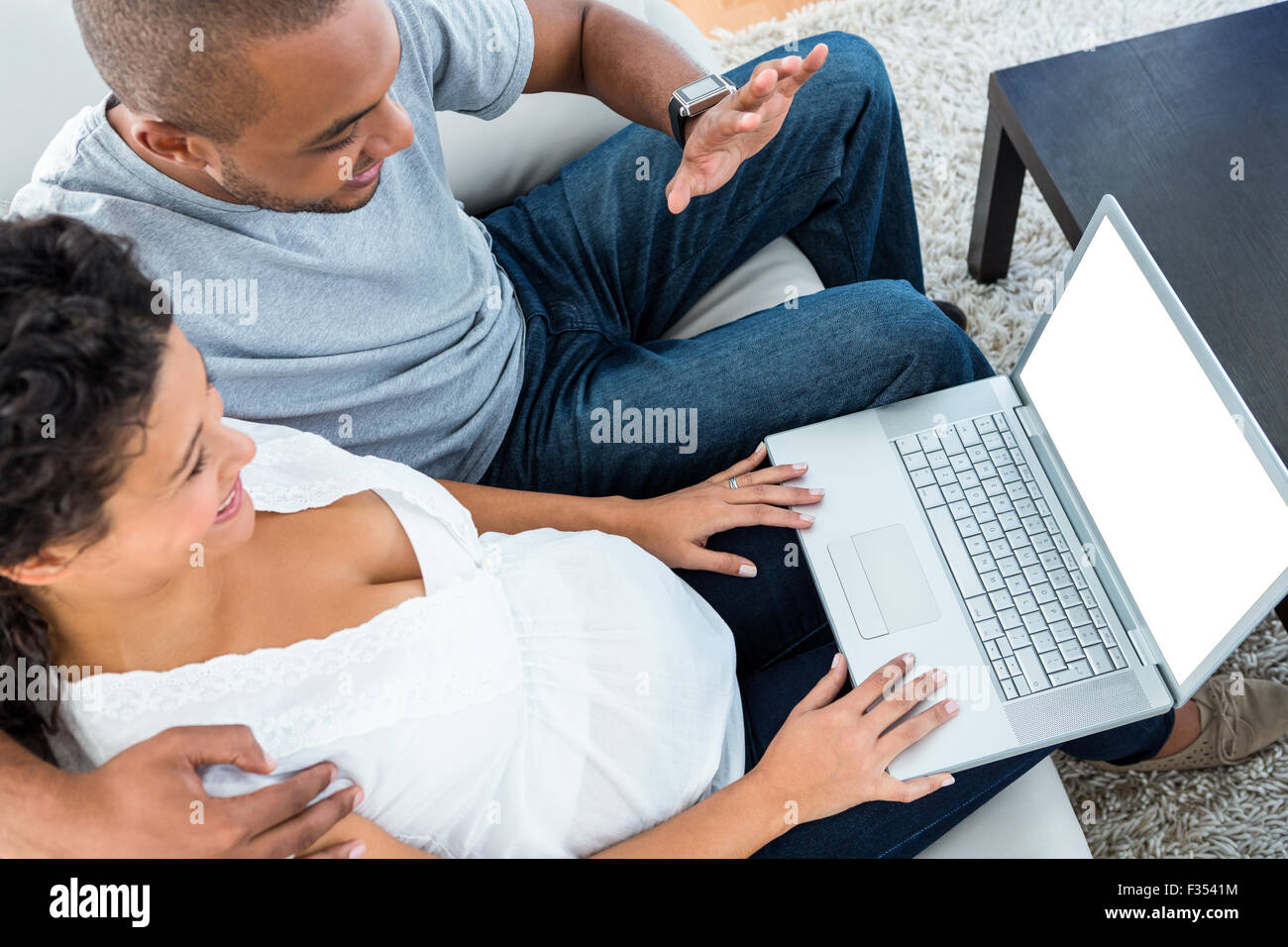 Young couple video chatting Stock Photo - Alamy