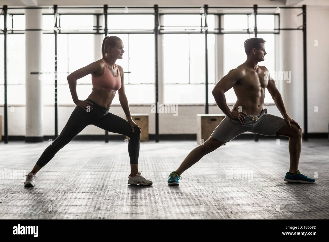 Two fit people doing fitness Stock Photo - Alamy