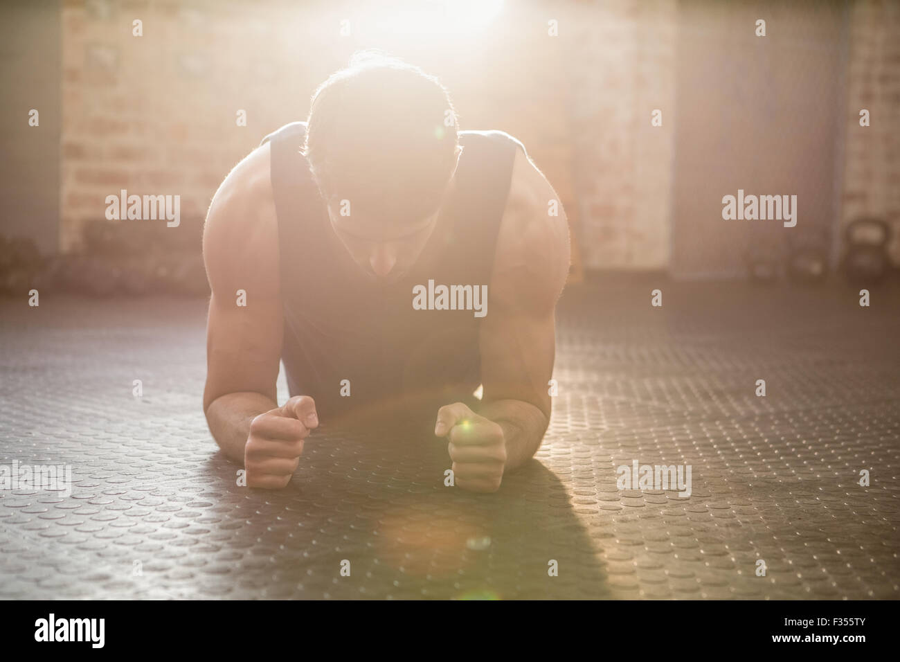 Man doing plank exercise Stock Photo - Alamy