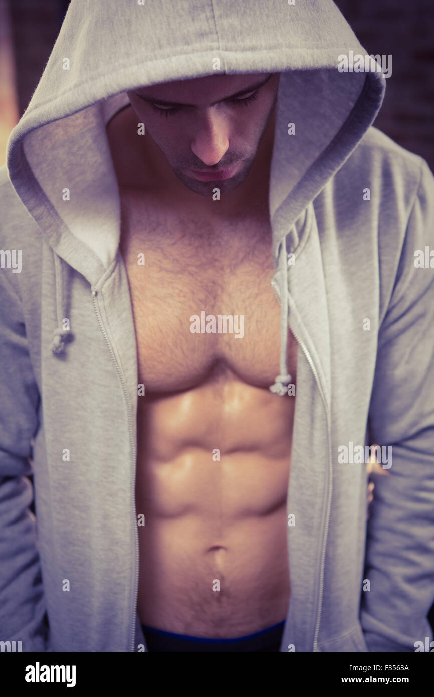 Handsome man wearing hood Stock Photo - Alamy