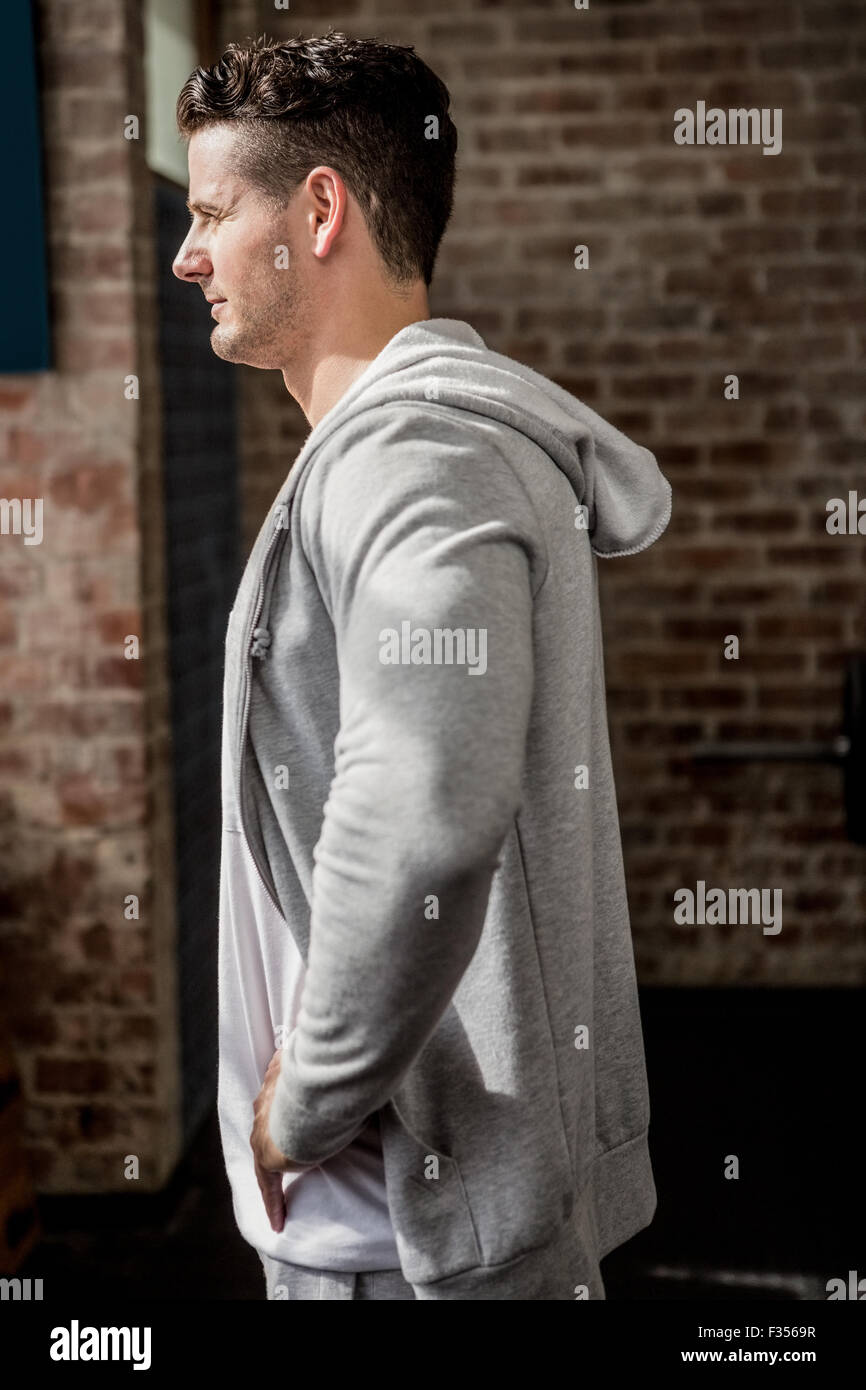 Side view of man wearing hood Stock Photo - Alamy