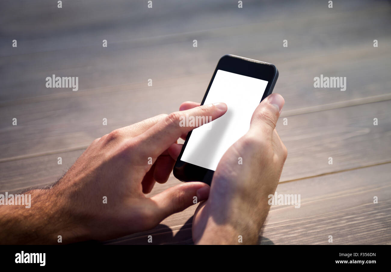 Cropped image of person using mobile phone Stock Photo - Alamy