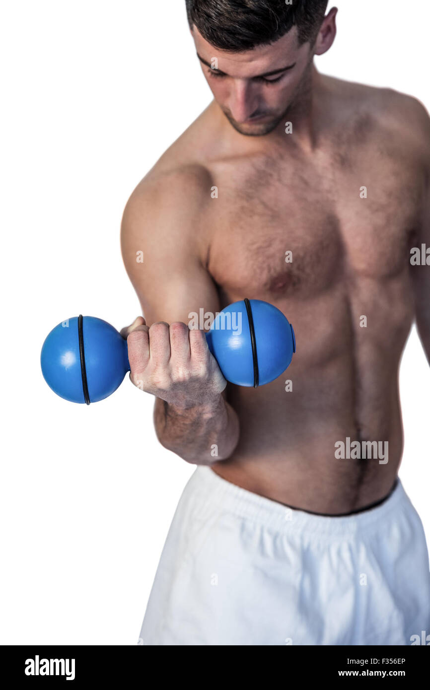 Man lifting blue dumbbell Stock Photo - Alamy