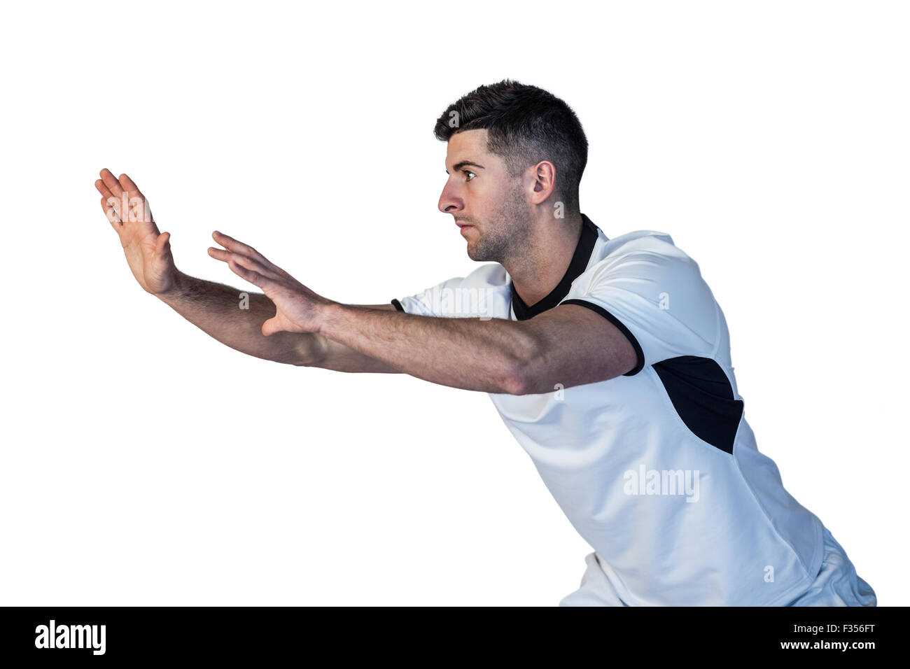 Side view of rugby player positioning Stock Photo - Alamy