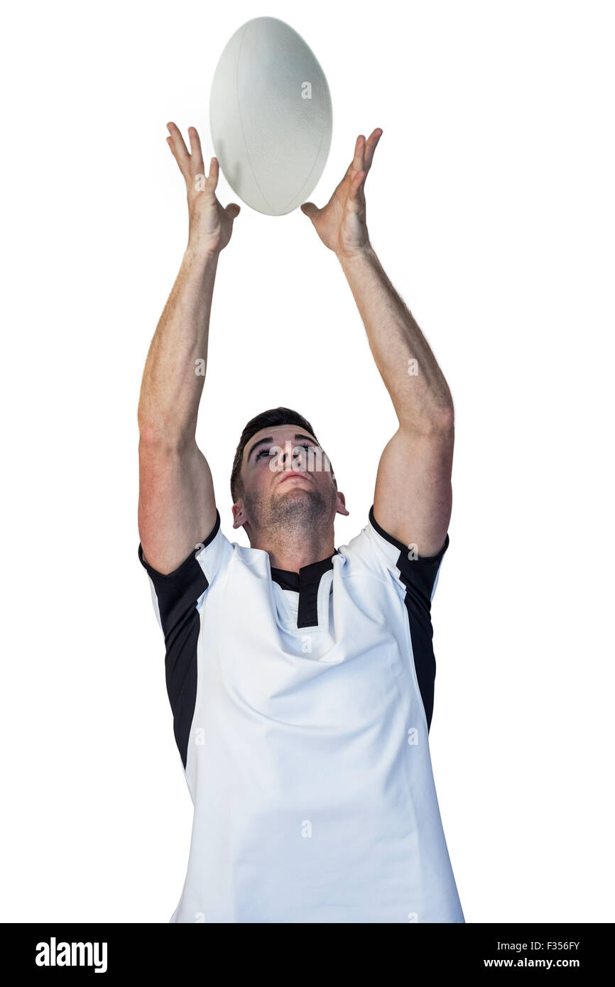 Rugby player catching the ball Stock Photo - Alamy