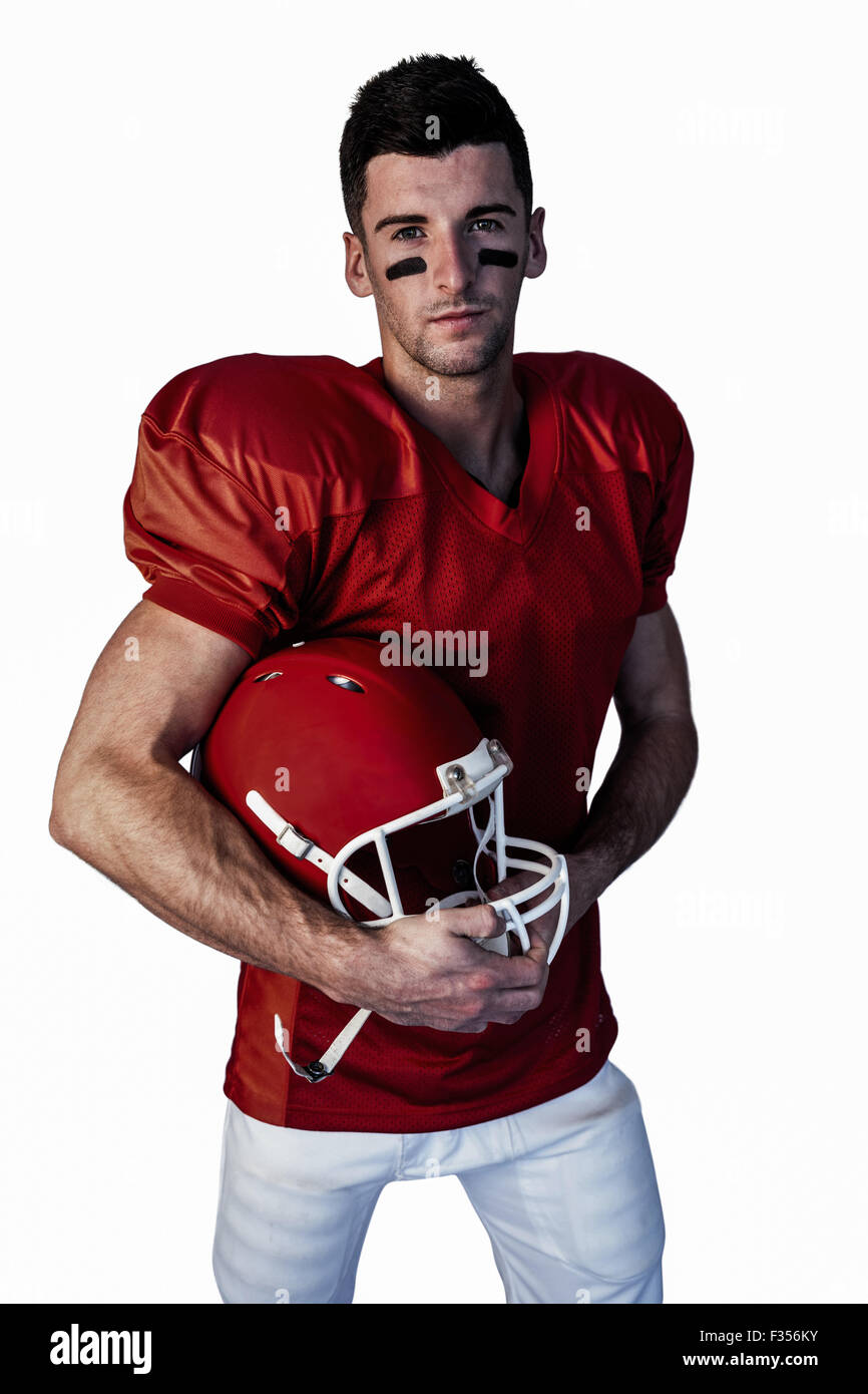 Portrait of rugby player posing with helmet Stock Photo - Alamy
