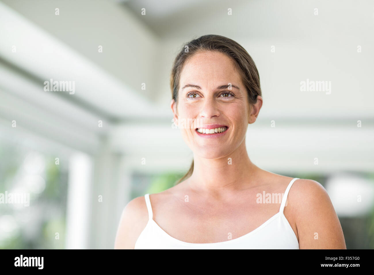 Happy woman at home Stock Photo - Alamy