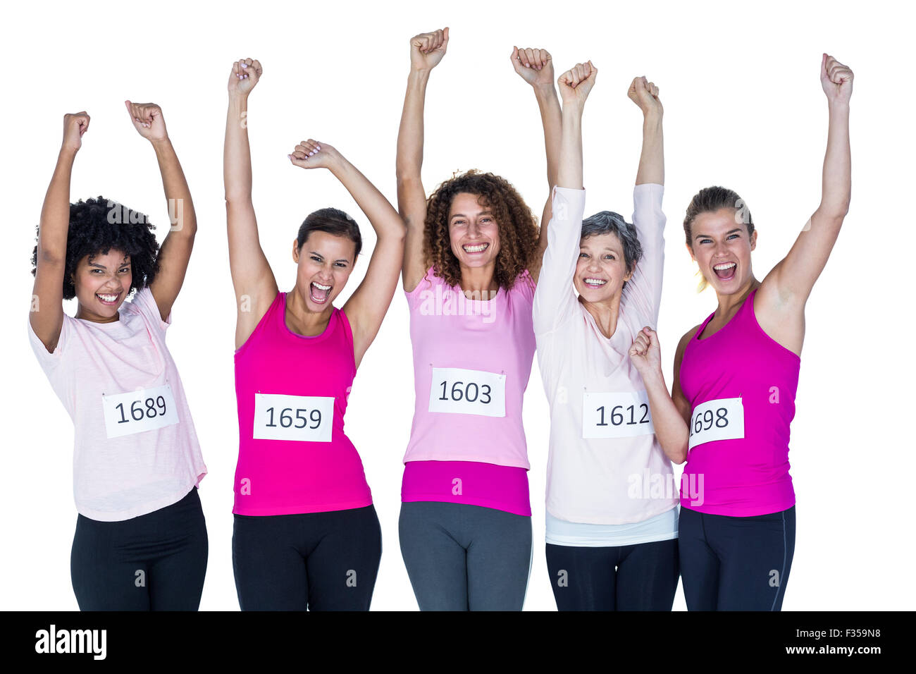 Portrait of smiling athletes with arms raised Stock Photo - Alamy