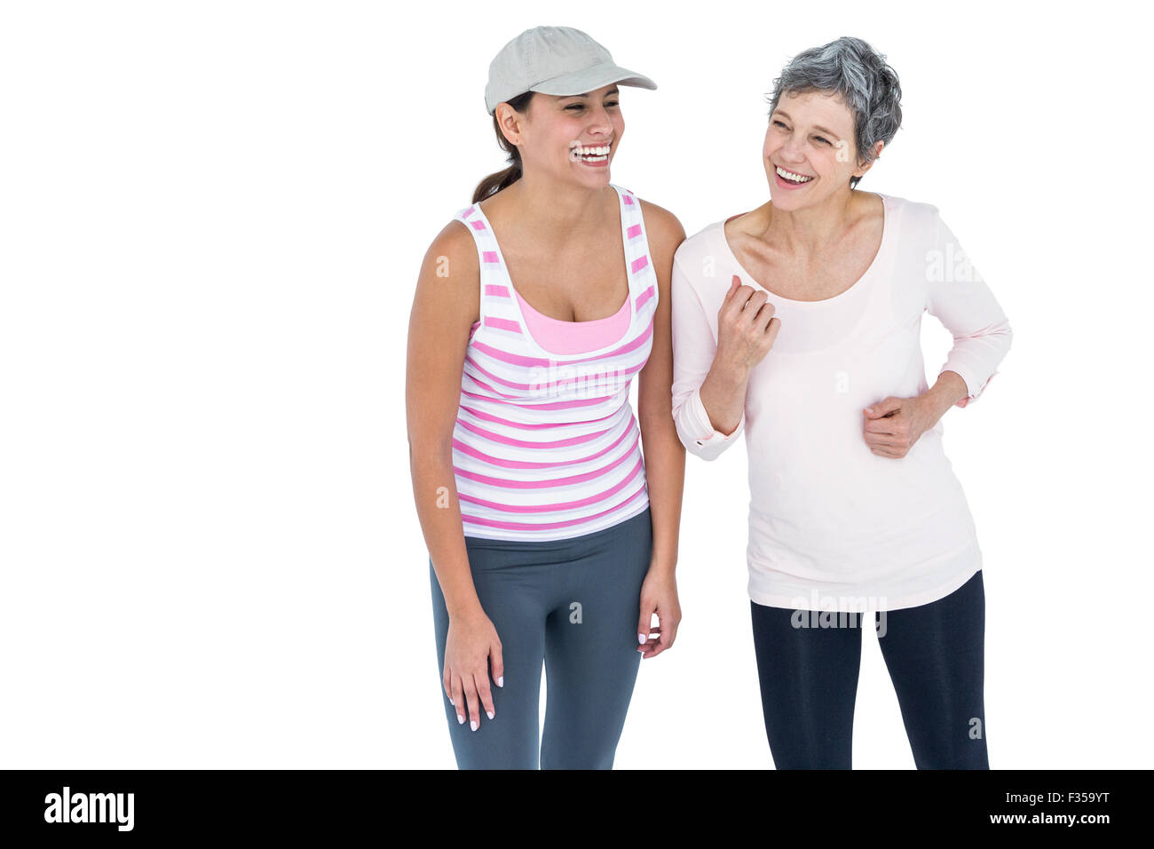 Cheerful fit women standing Stock Photo - Alamy