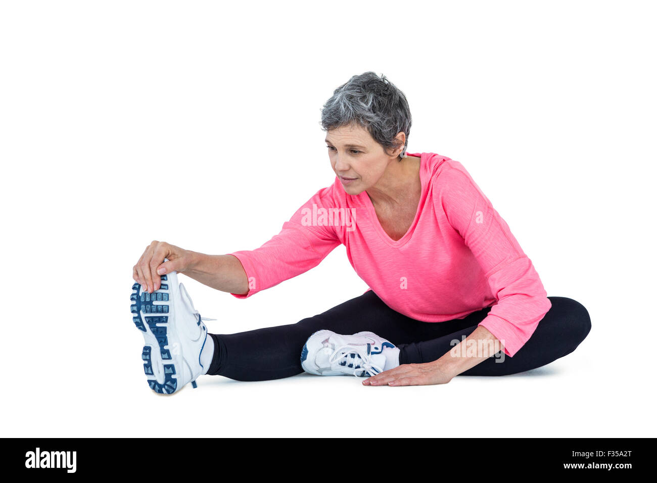 Fit mature woman exercising Stock Photo - Alamy